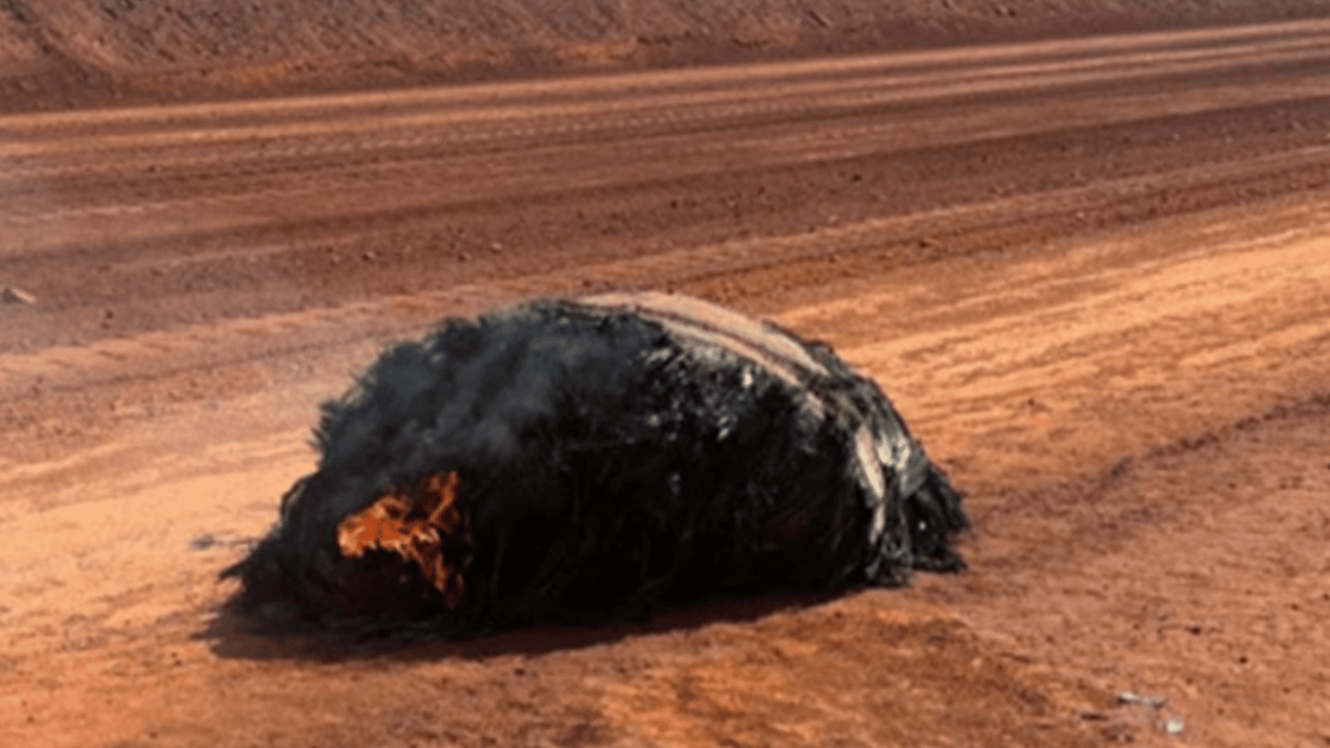Mysterious smouldering object lands in Australian Outback as experts ...