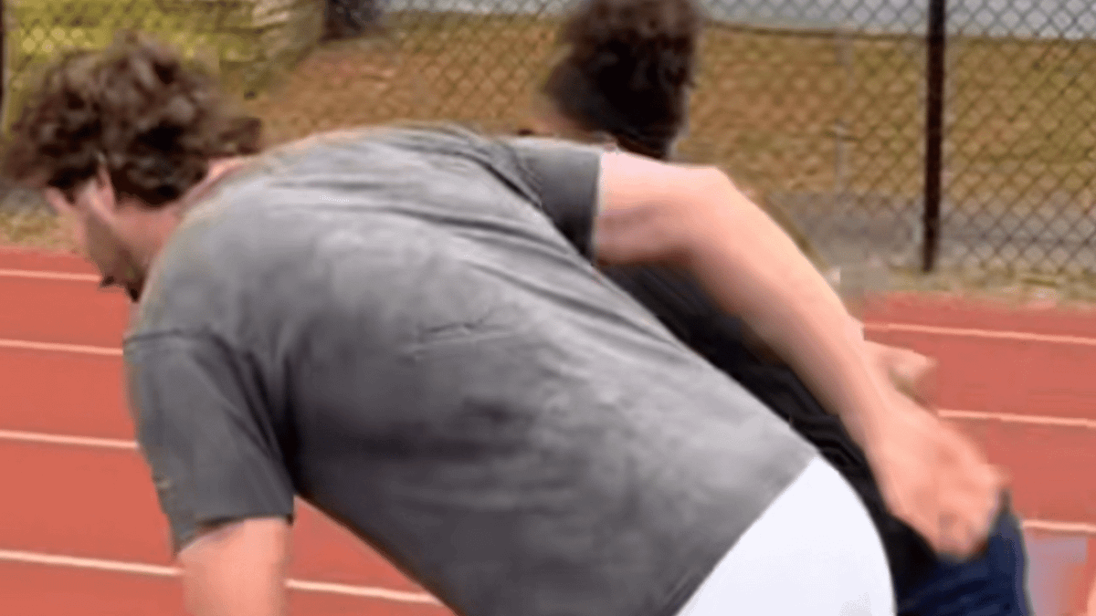 Female track and field star was challenged to a race by man who was ...