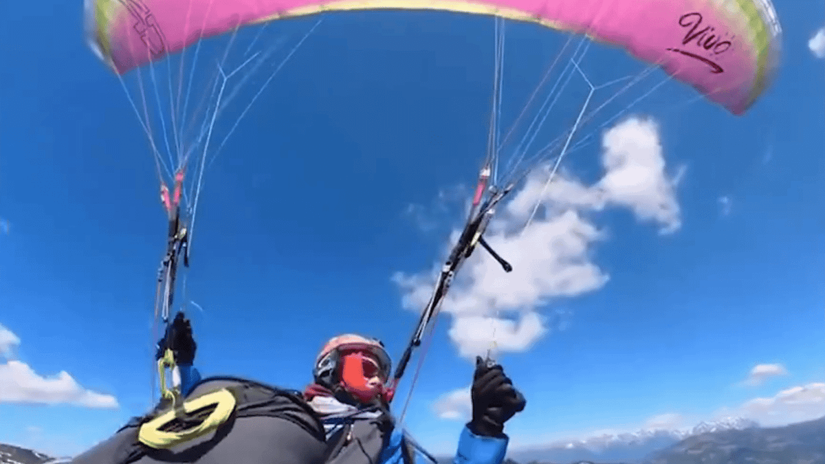 Horrifying moment paraglider collides with plane over Alps