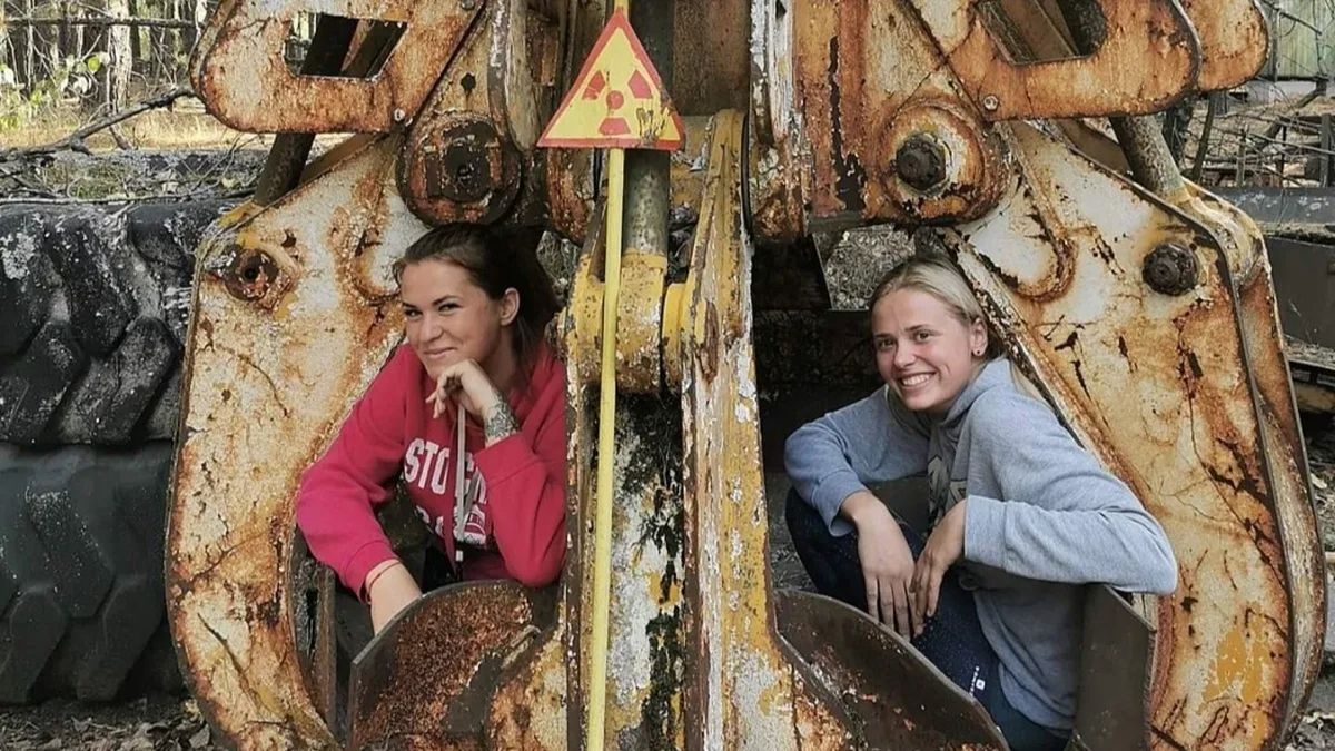 Truth behind chilling photo of two women sitting on 'the most ...
